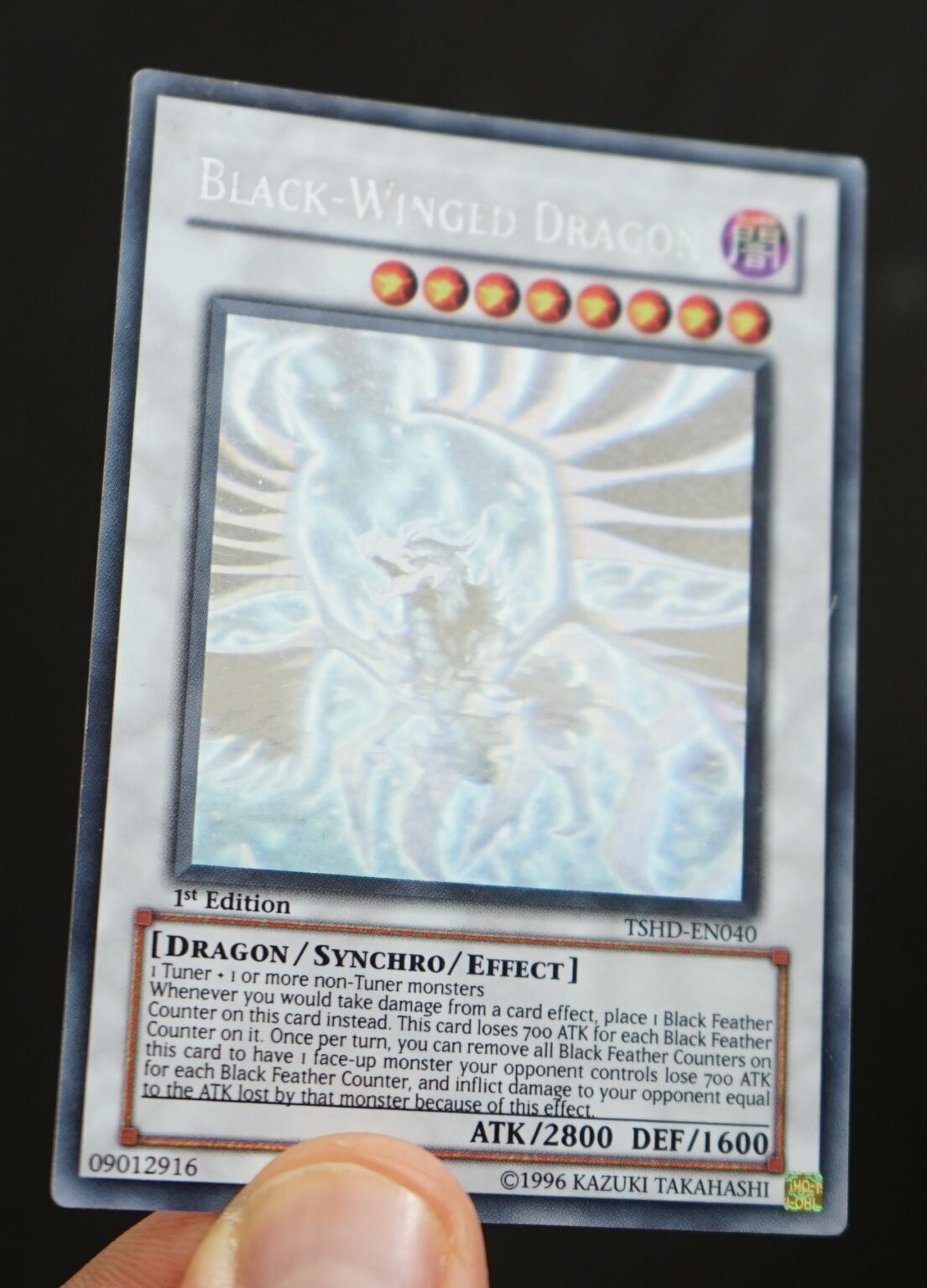 Black-Winged Dragon Ghost Rare | L'Oscurità Brillante YGO